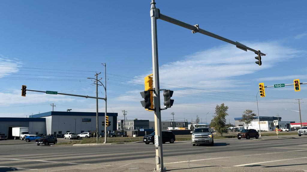 Traffic signals out on 100th Street, Alaska Highway